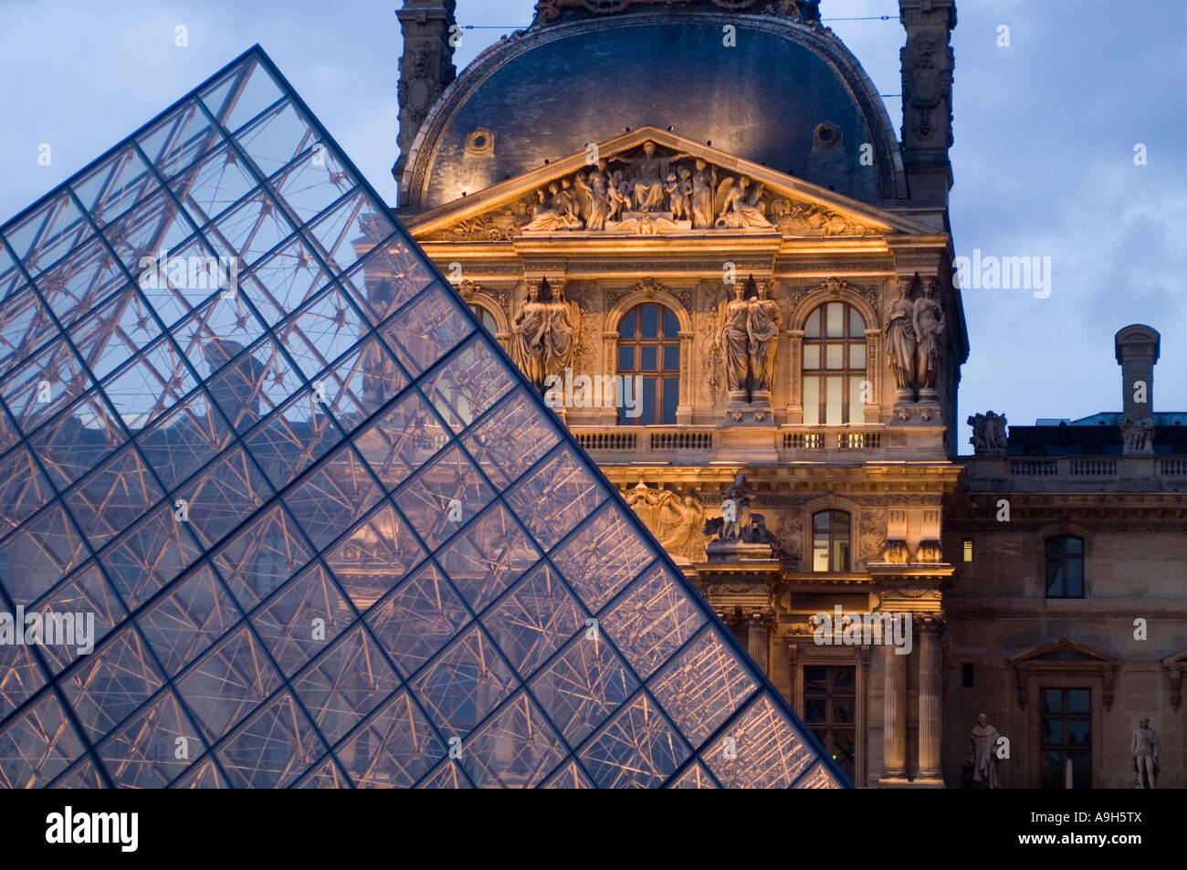 Paris. France. The Musee du Louvre at dusk Stock Photo - Alamy