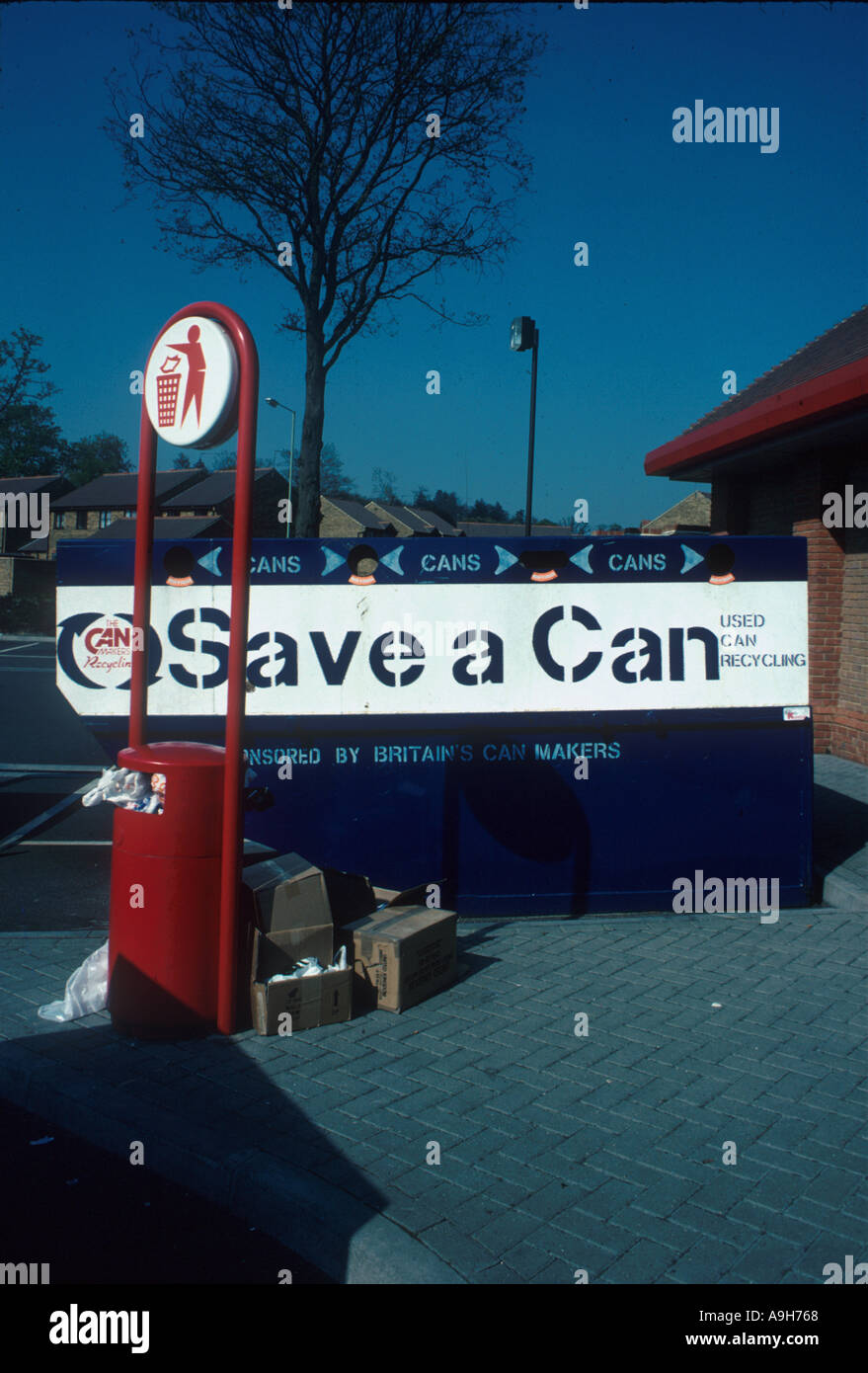 Conservation Recycling Can Bank in car park Stock Photo - Alamy