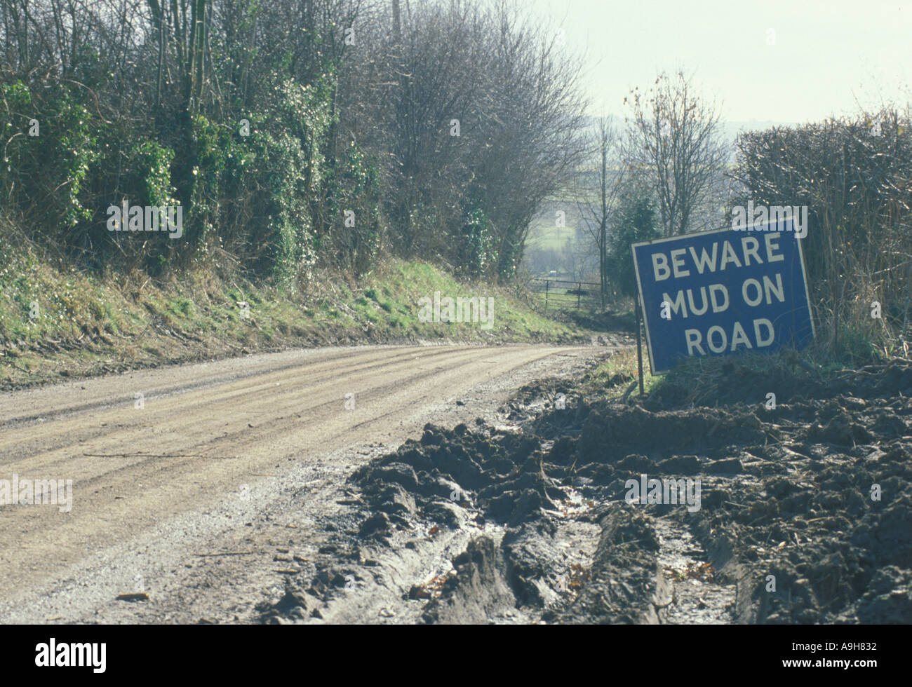 Signs and Signposts Beware mud on road sign Hazard of country roads ...