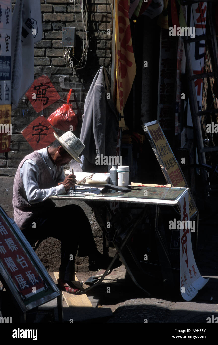 Scribe doing calligraphy on the streets of Chengdu China Stock Photo ...