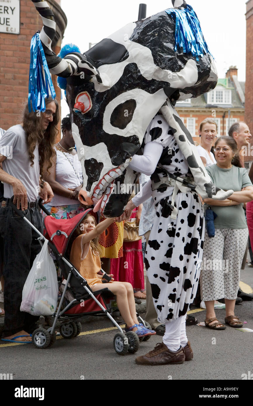 Costumed carnival performer interacting with the watching crowd Stock ...