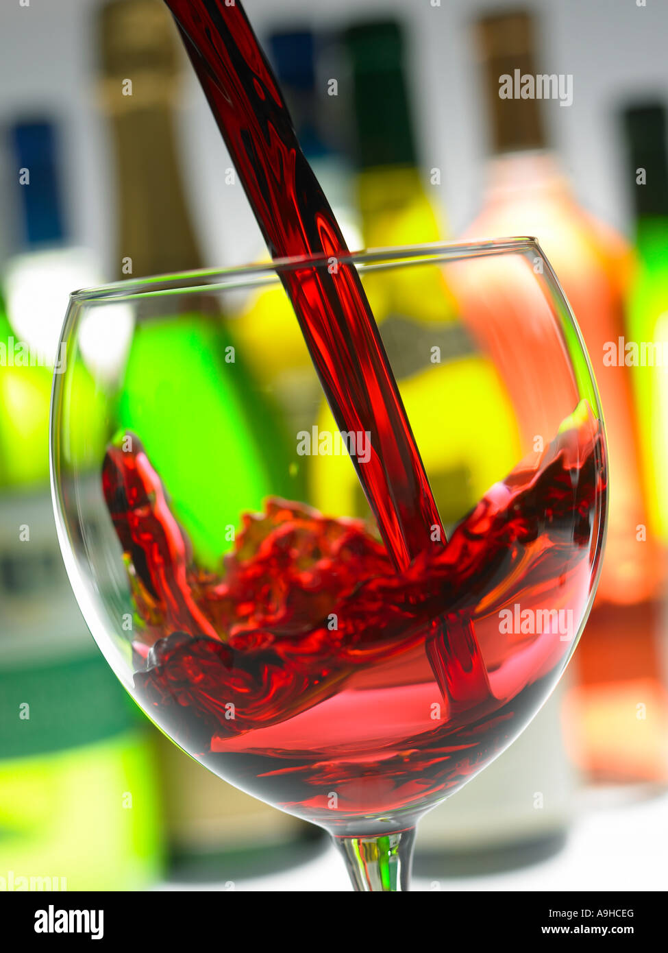 Pouring red wine Stock Photo - Alamy