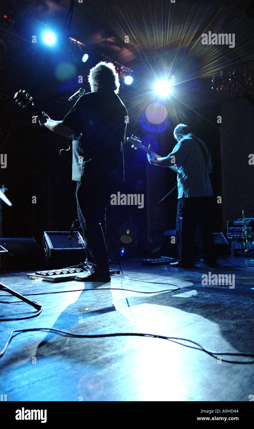 Band performing on stage Stock Photo - Alamy