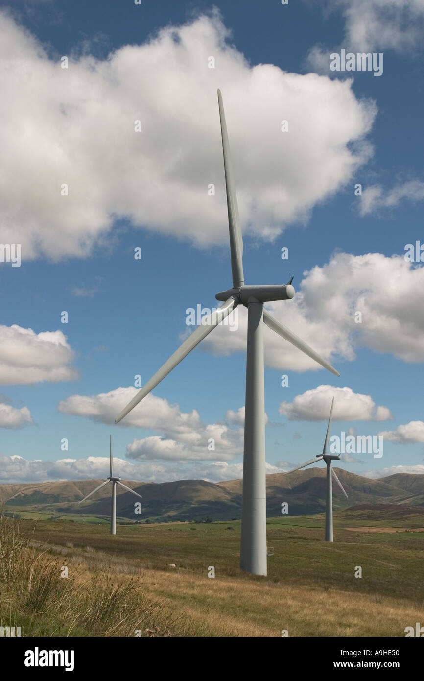 Wind power turbines producing electricity for part of Cumbria UK at ...
