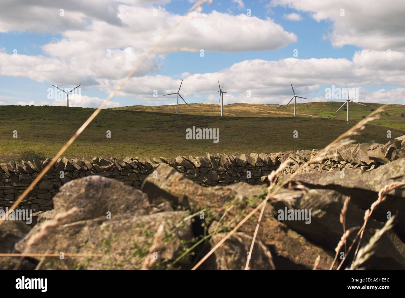 Wind power turbines producing electricity for part of Cumbria UK at ...