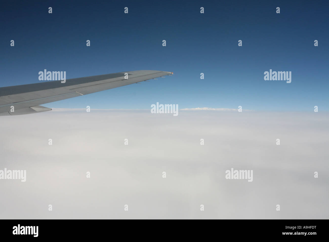 jet aircraft in flight, detail of the wing Stock Photo - Alamy