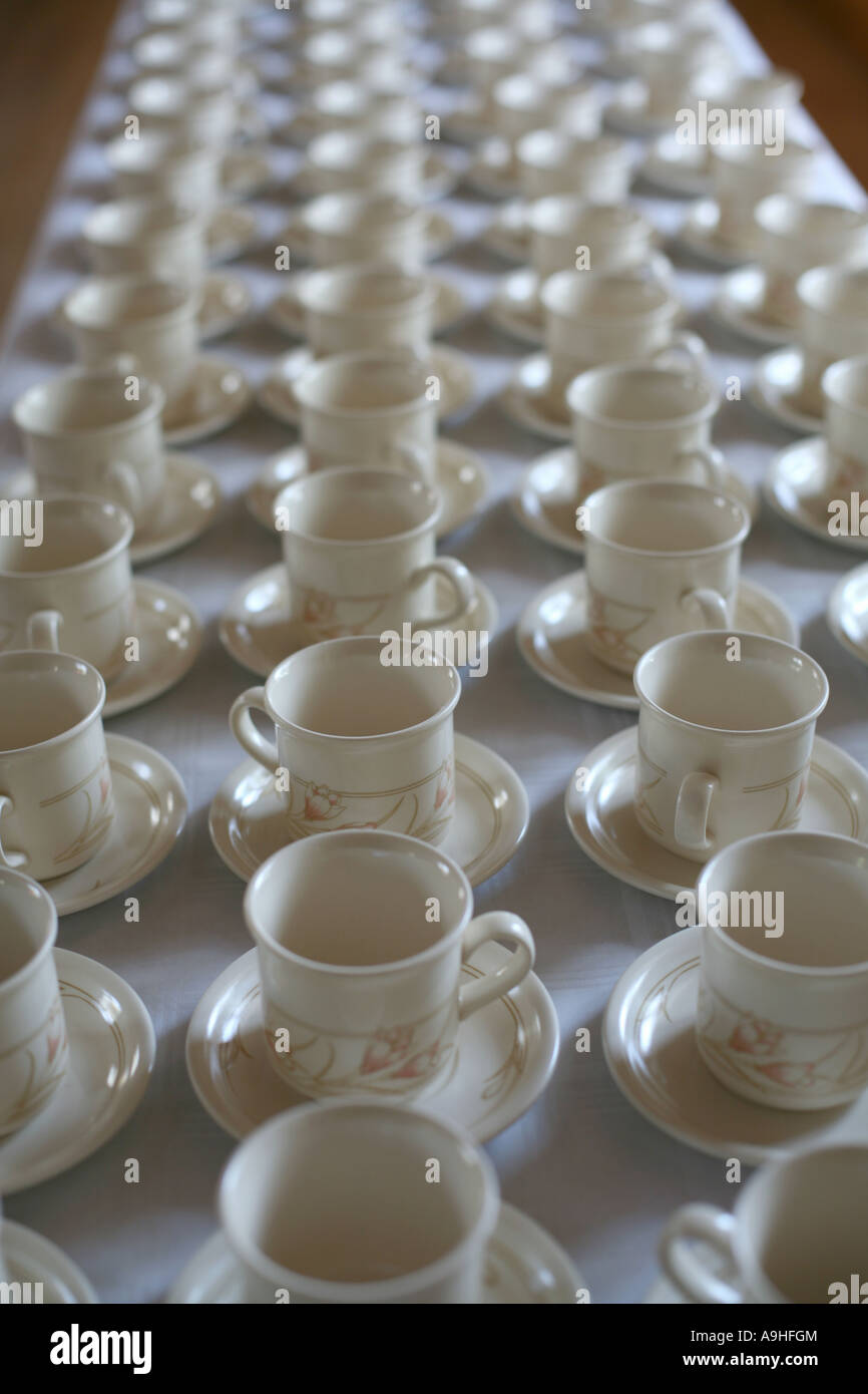 rows of tea cups on a table Stock Photo - Alamy