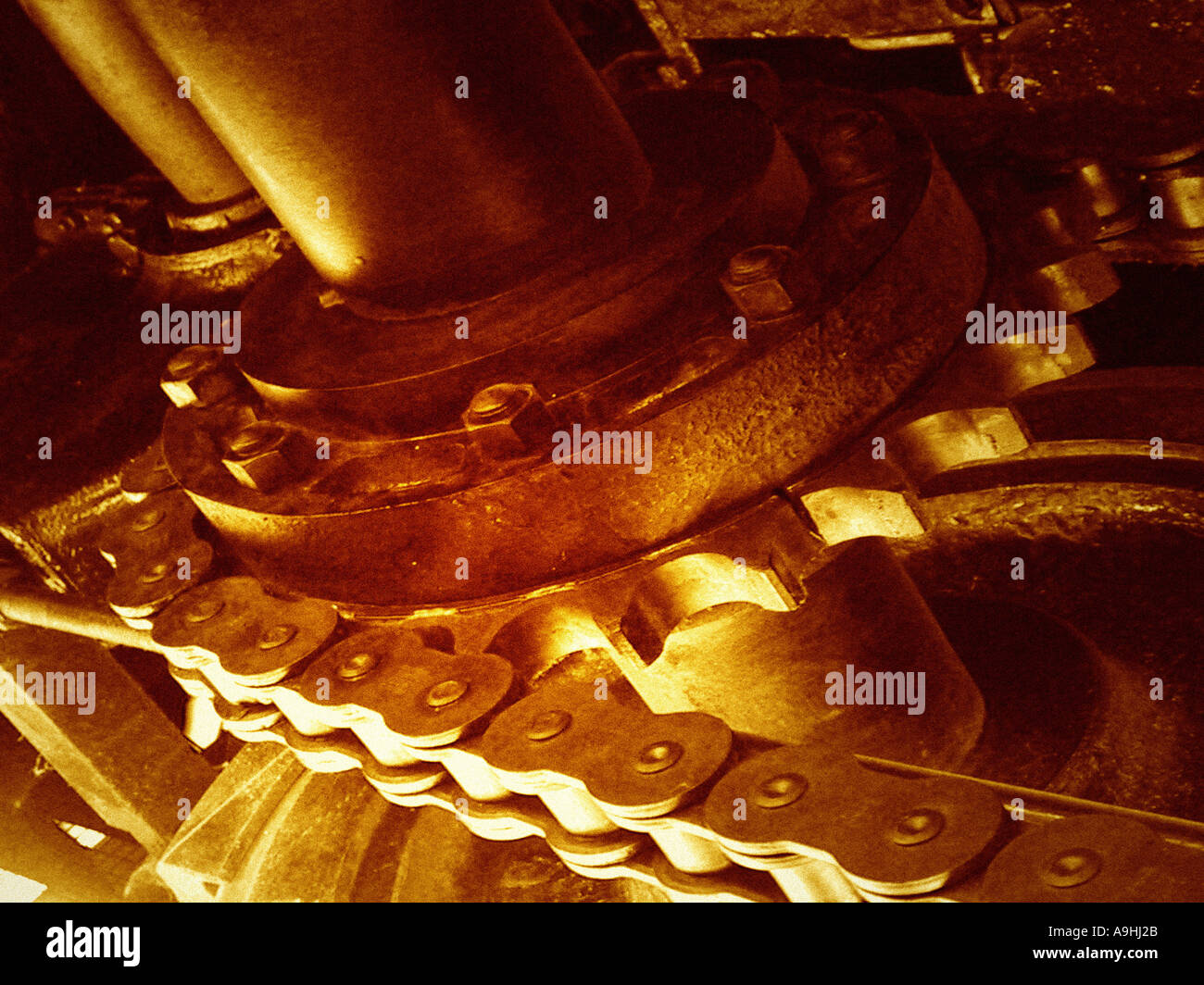 Golden cog wheels hi-res stock photography and images - Alamy