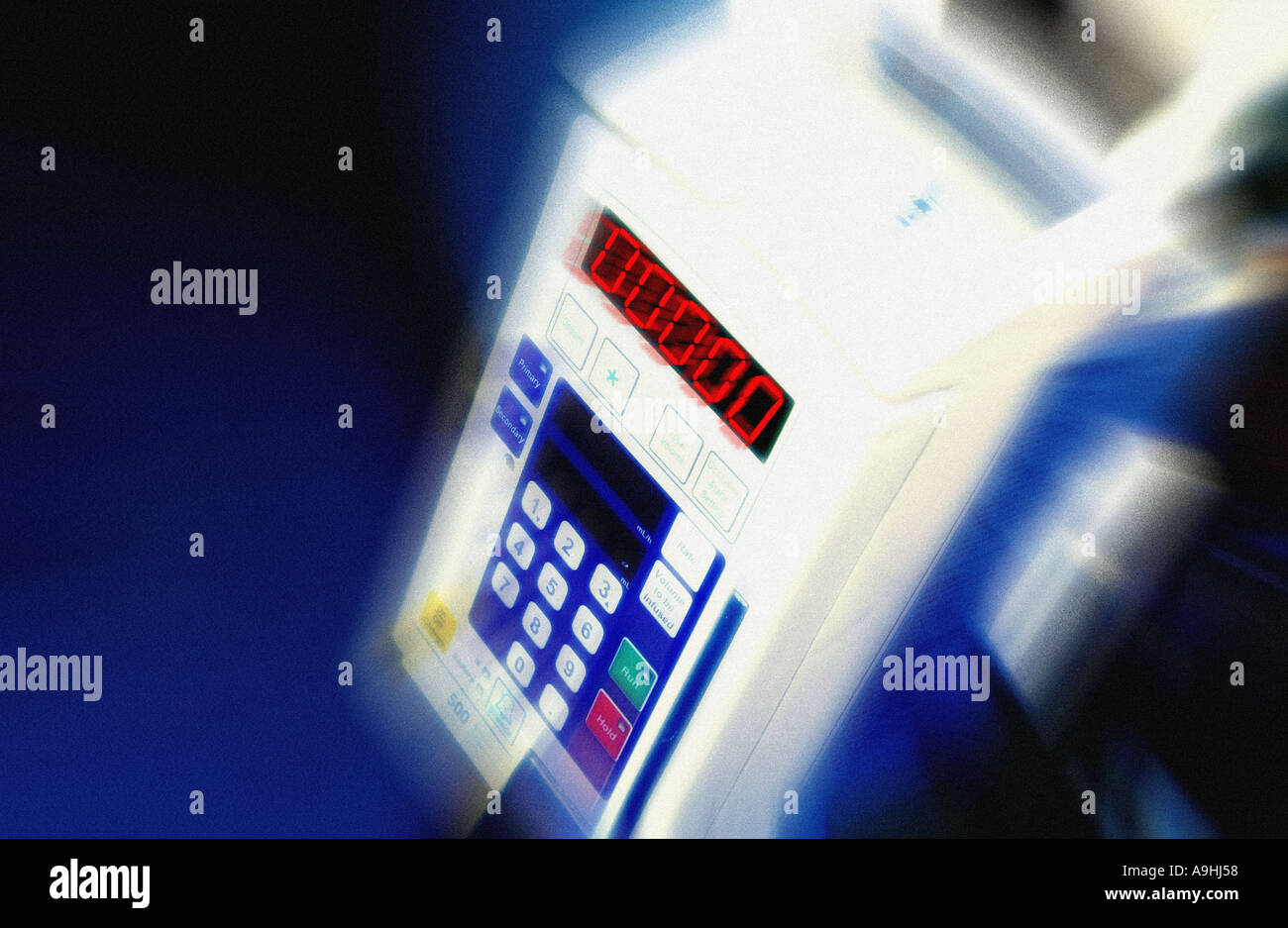 Digital display on an intravenous drip monitor creatively blurred for ...