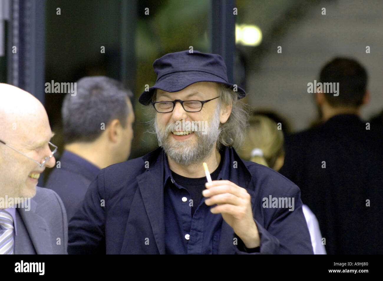 german art artists smoking cigarette man bearded beard Stock Photo - Alamy