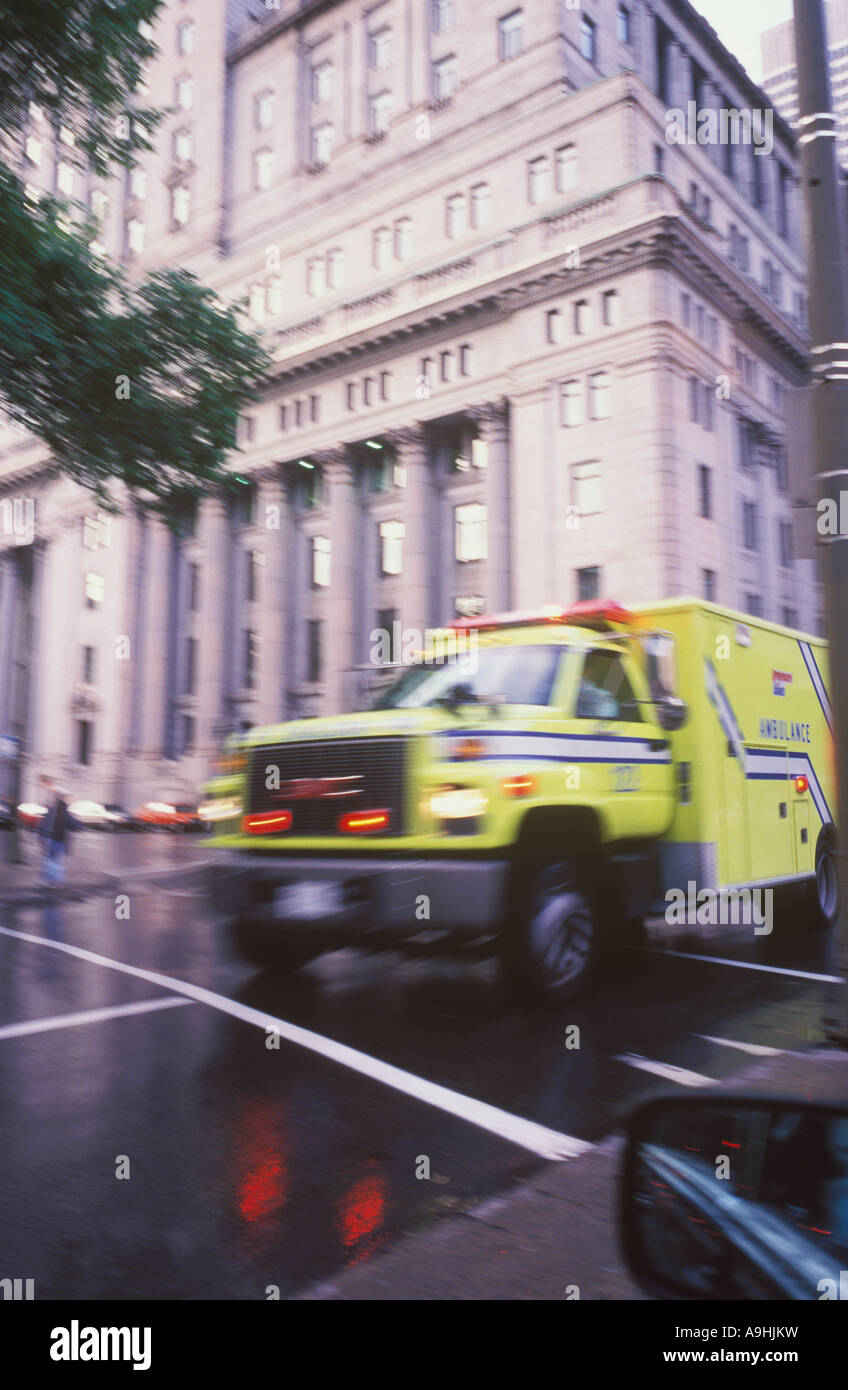 Ambulance responds to medical emergency, rushing through Downtown City ...