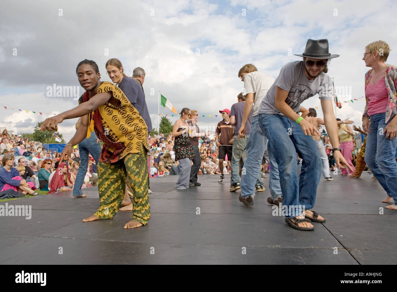 Crowd joining in with an african dance exhibition at the Towersey ...