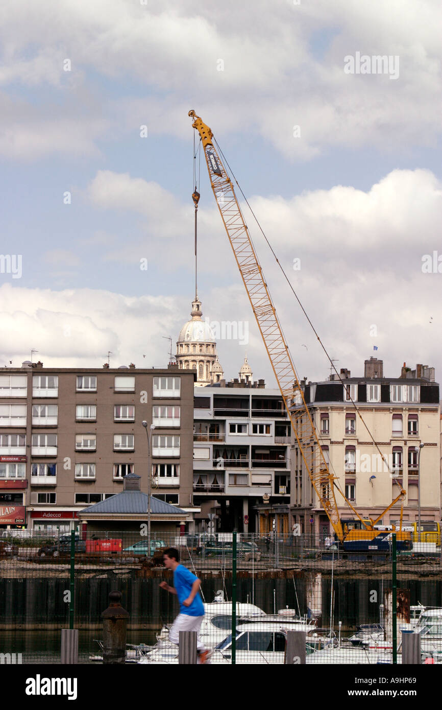 Crane and redevelopment of riverside area Appears to be lifting dome of ...
