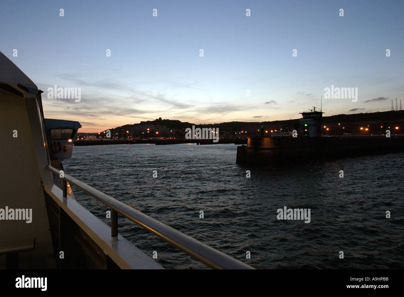 Dover harbour at sunset from deck of Speedferries catamaran Stock Photo ...