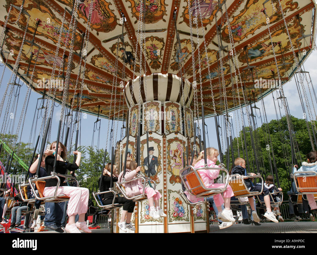 Fairground swing ride children hi-res stock photography and images - Alamy