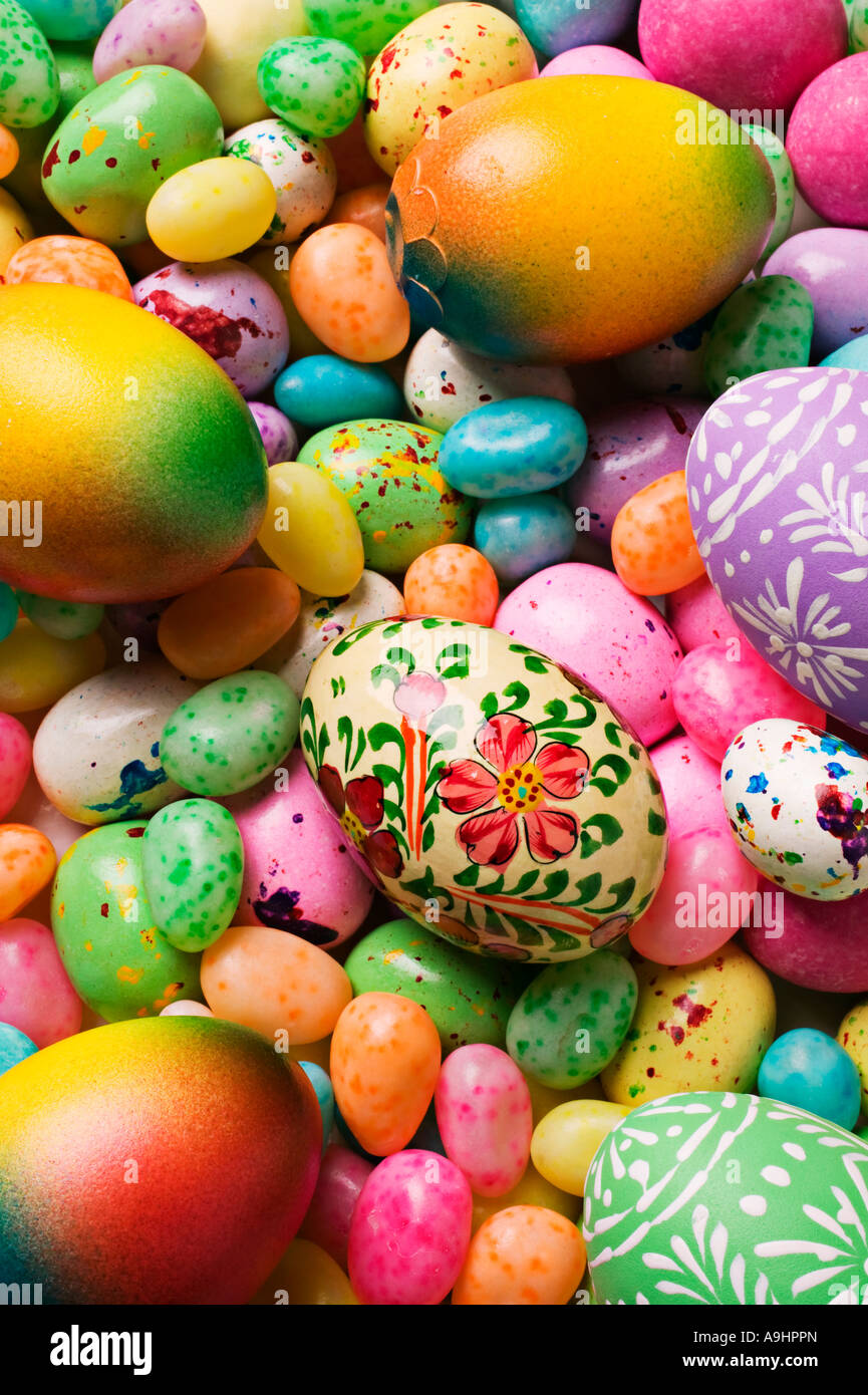 Easter eggs and jelly beans, hand painted egg Stock Photo - Alamy