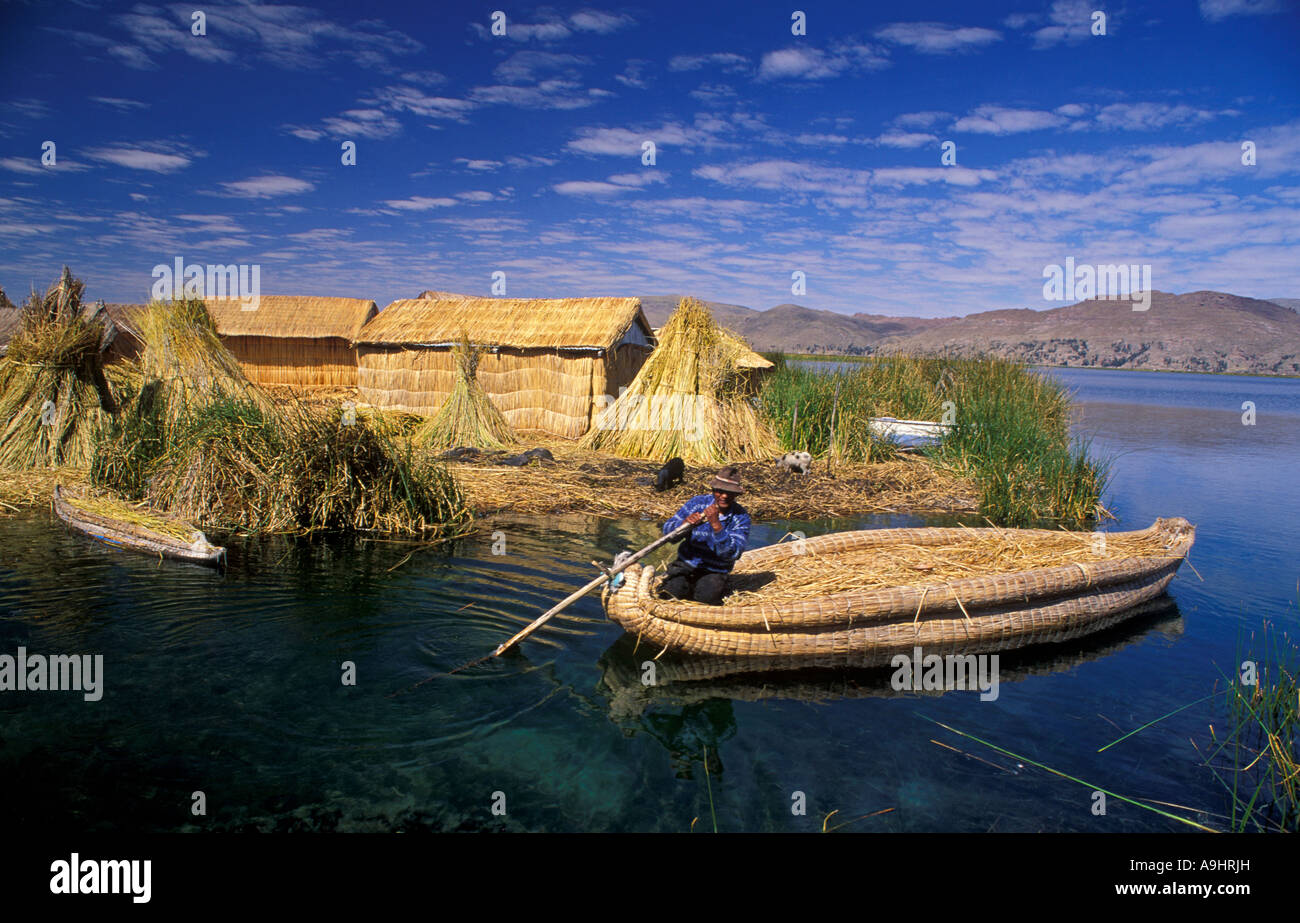 Ayamara Indian paddling his reed boat and floating island on the ...
