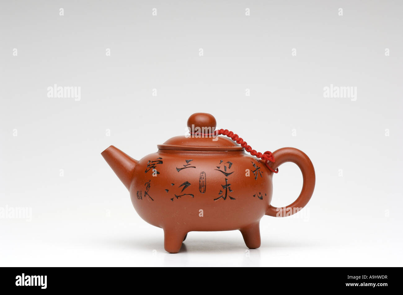 Little tea pot, red clay with black Chinese ideographs, China Stock ...