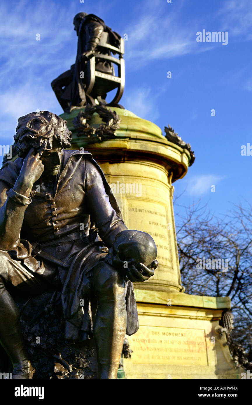 Statue of Hamlet with a statue of William Shakespeare in the background ...