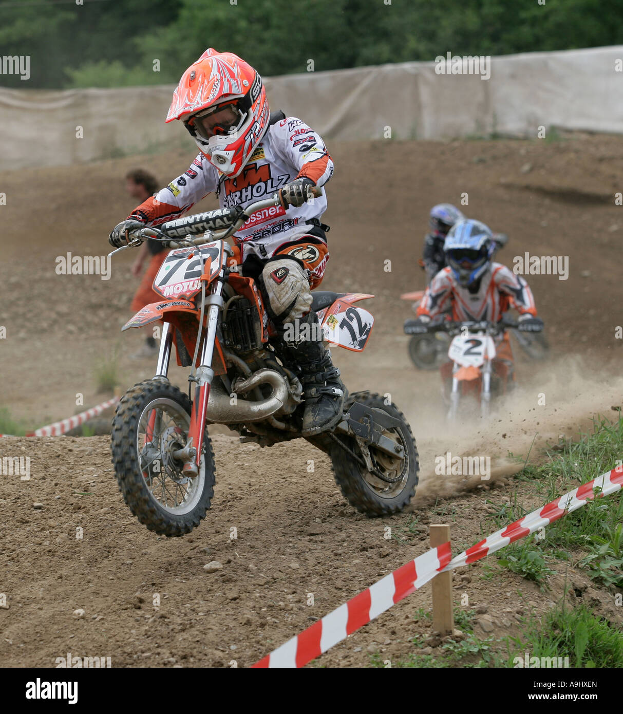 A child driving motocross Stock Photo - Alamy