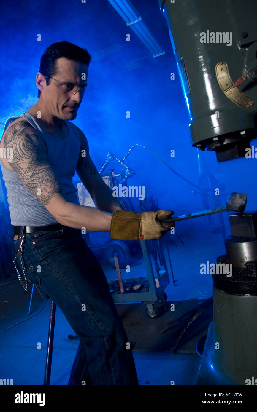 American blacksmith works on a Power hammer Stock Photo - Alamy