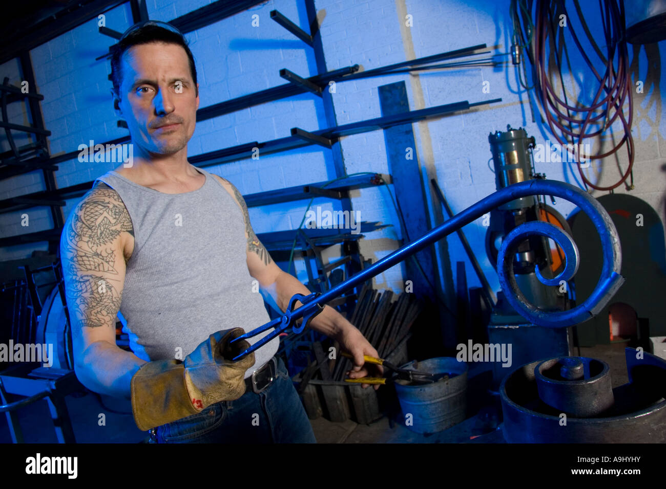 Blacksmith showing his metal work Stock Photo - Alamy