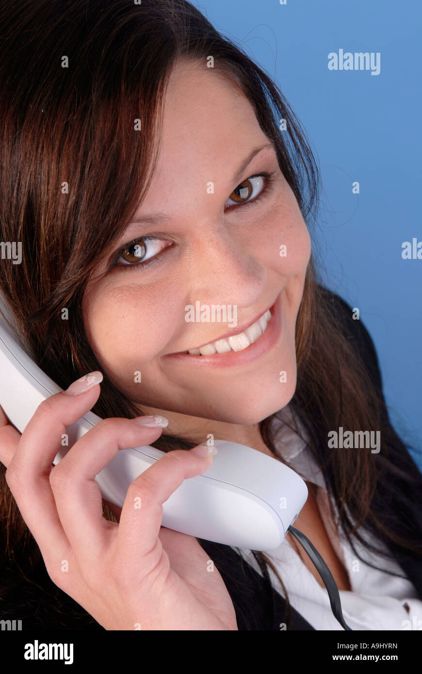 Young women have a call Stock Photo - Alamy