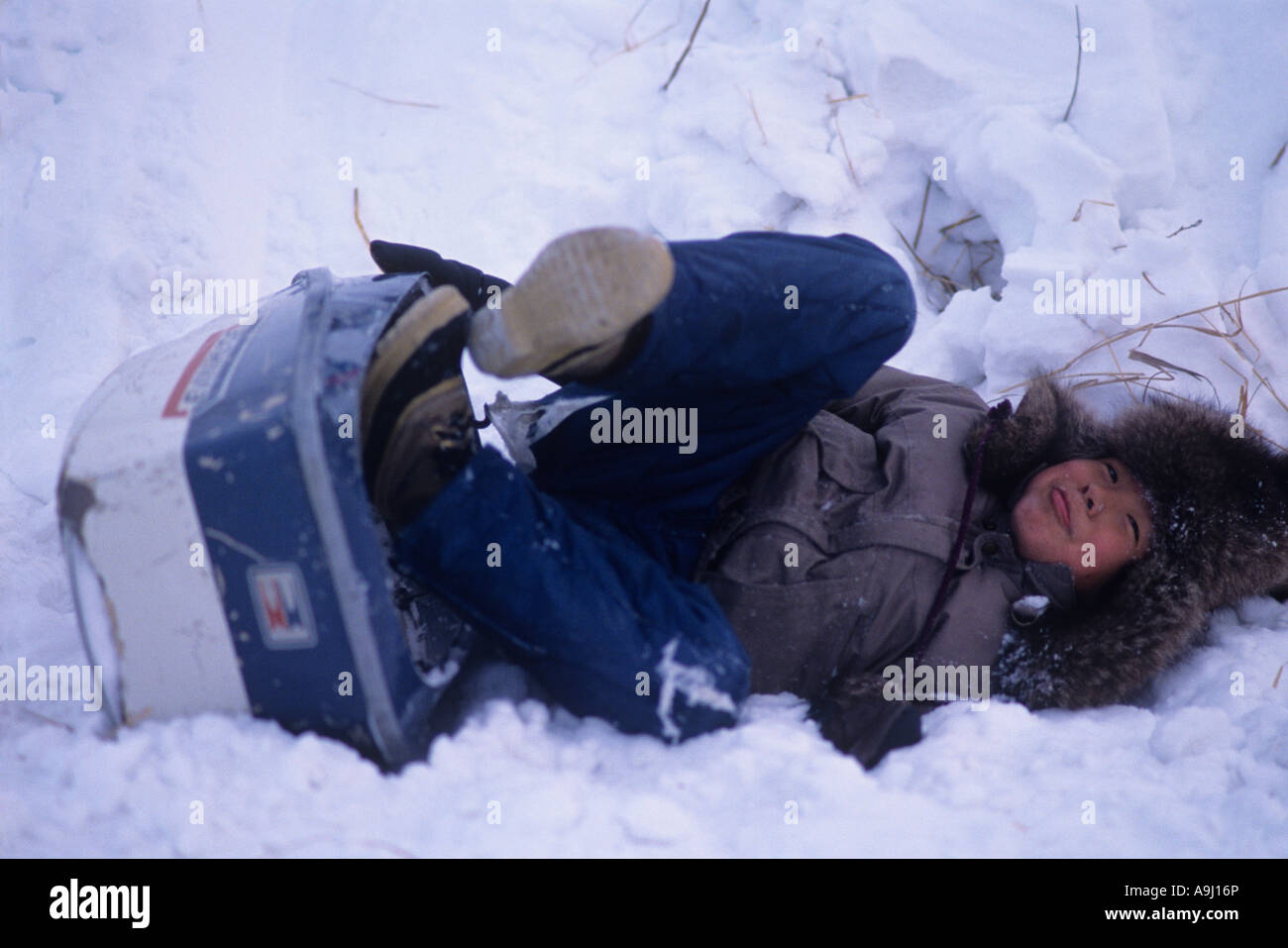 USA Alaska Eskimo children play with outdoor motor shell in Bering Sea ...
