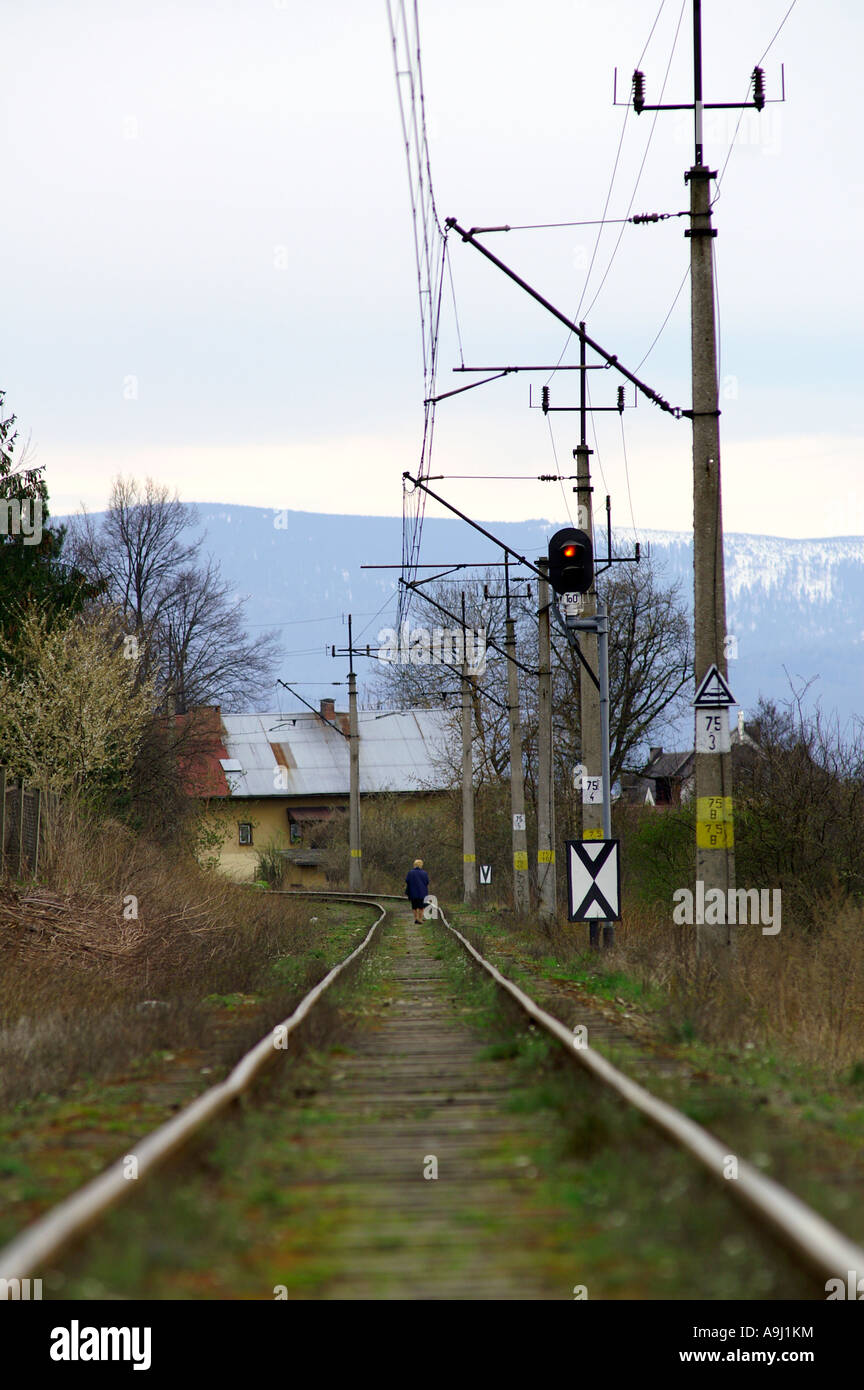 old woman on railroad tracks Stock Photo - Alamy