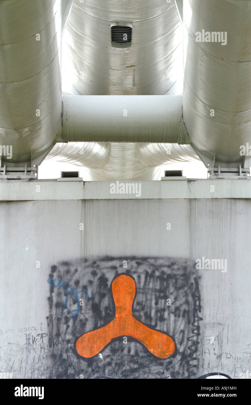 graffiti on the pillar under large pipe Stock Photo - Alamy