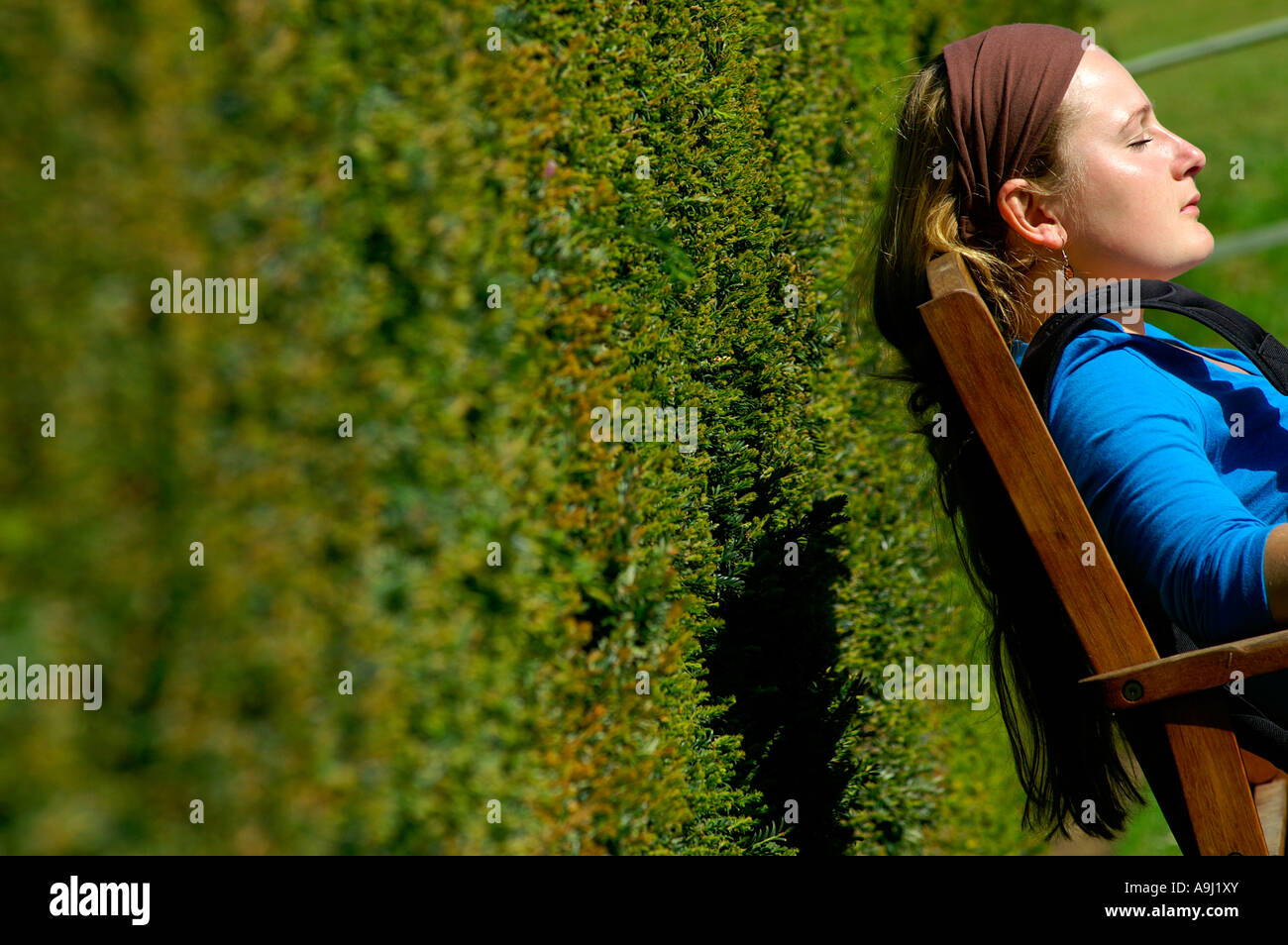 woman is taking sunbathe Stock Photo - Alamy