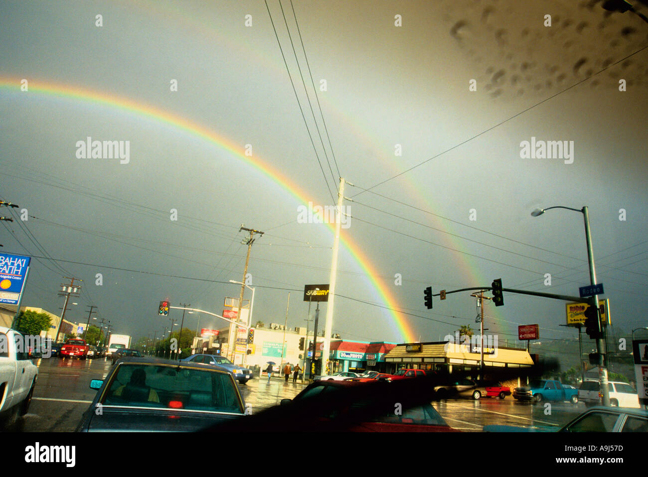a rainbow on a road trip Stock Photo - Alamy