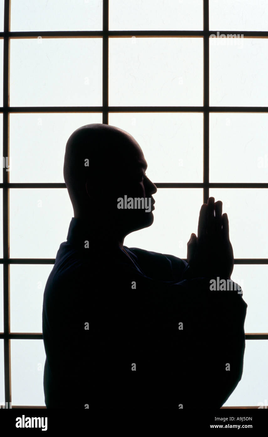 A Zen monk of the Soto School performs gassho salutation at the Seiryu ...