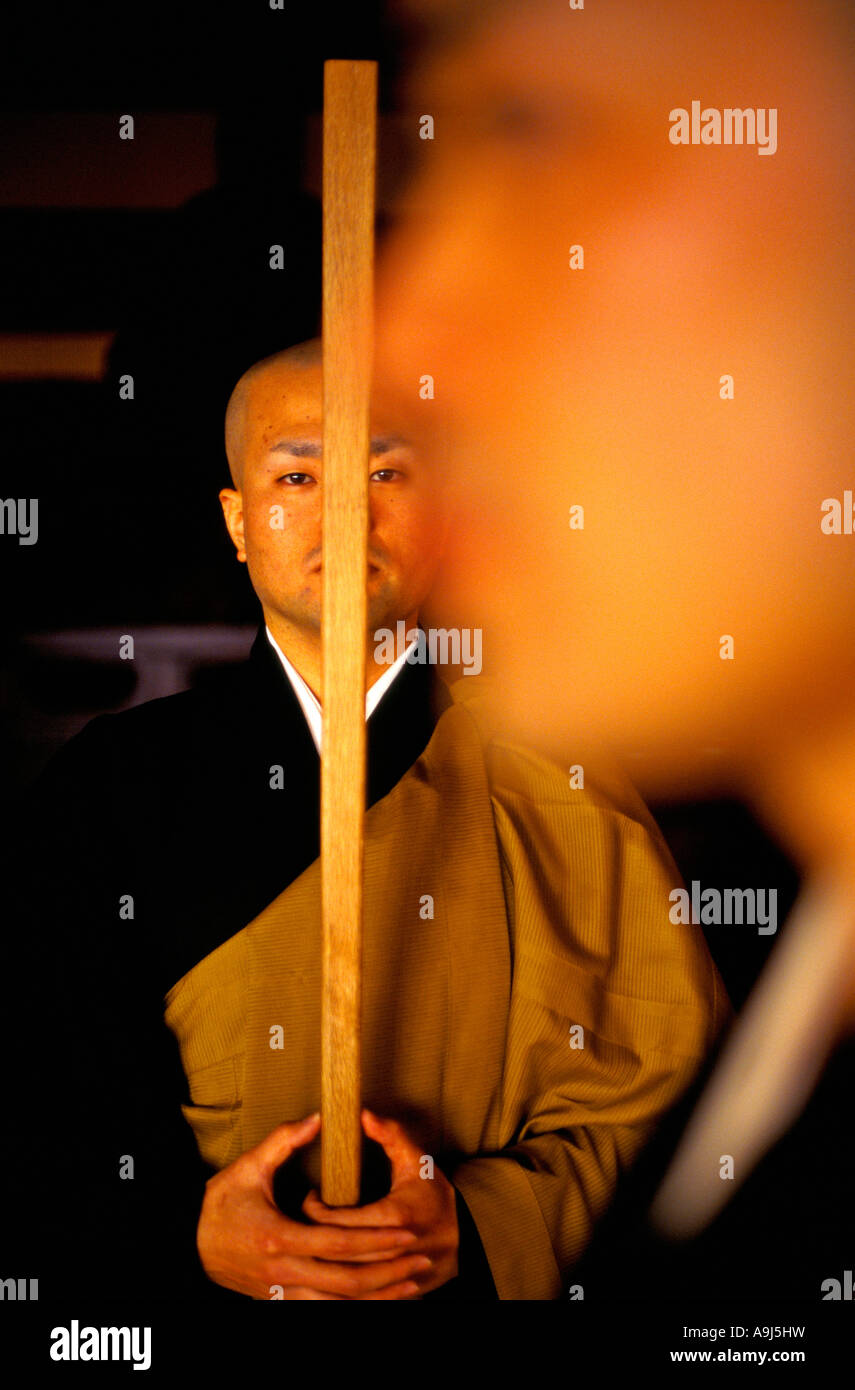 A Zen monk of the Soto School with a koyasaku at the Seiryu ji Temple ...