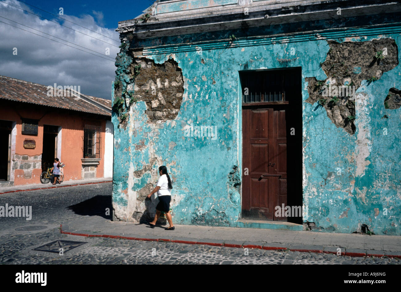 Earthquake damage on the facade of a home in the Guatemalan town of ...