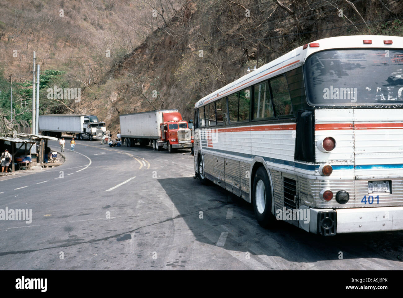 Trucks lined up for customs procedures at Las Chinamas border crossing ...