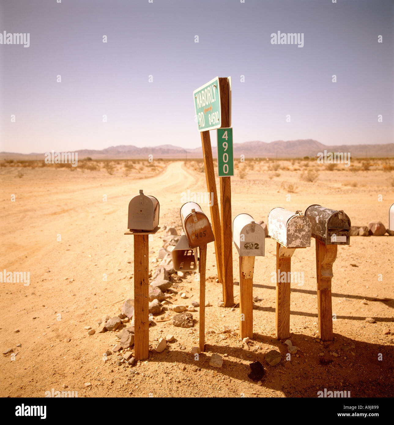 mailboxes along a dusty highway road in southern California Stock Photo ...