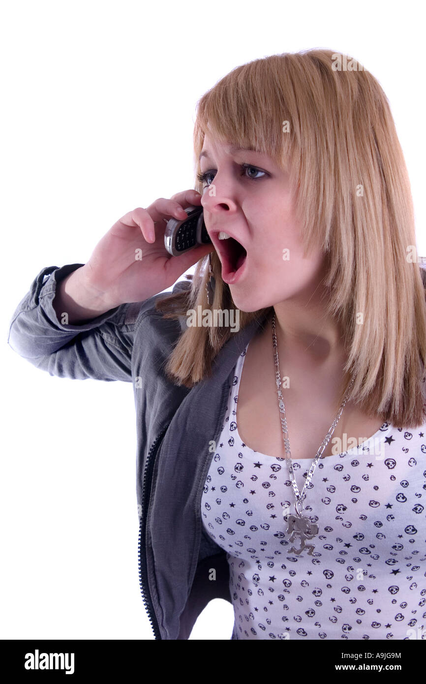 young girl shouting on phone mobile Stock Photo - Alamy