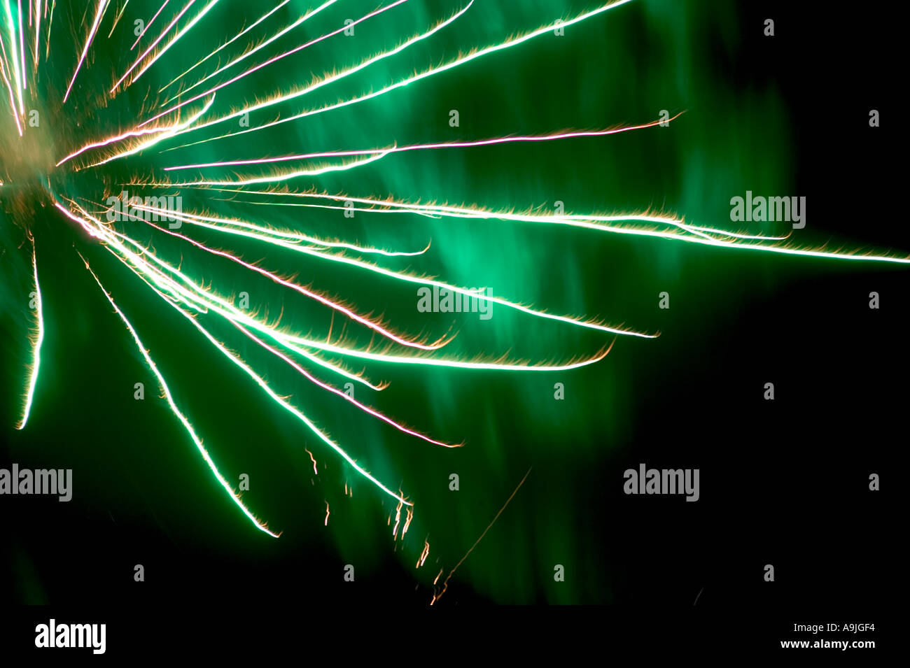 green fireworks on a night sky Stock Photo - Alamy