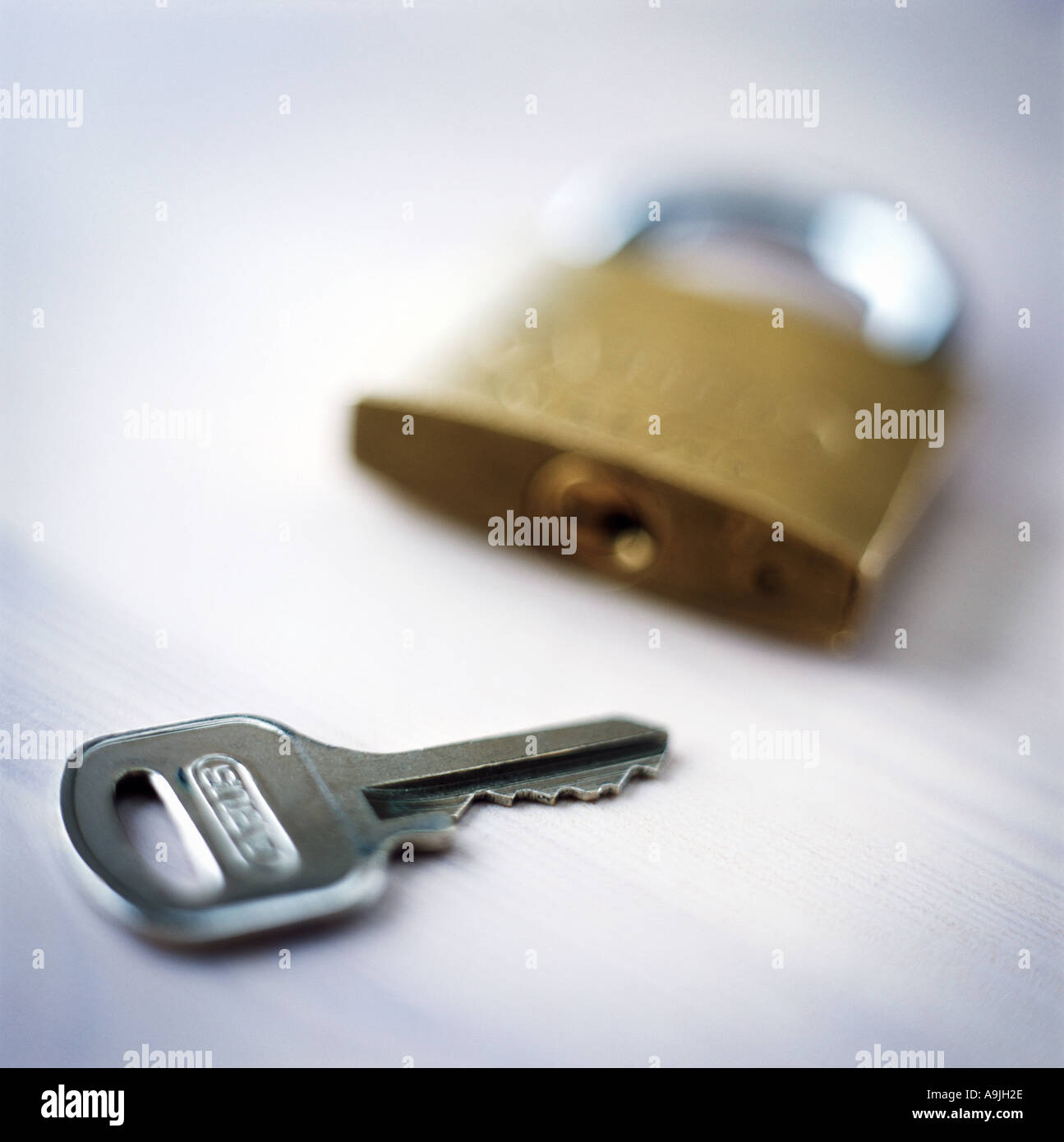 Padlock with key Stock Photo - Alamy