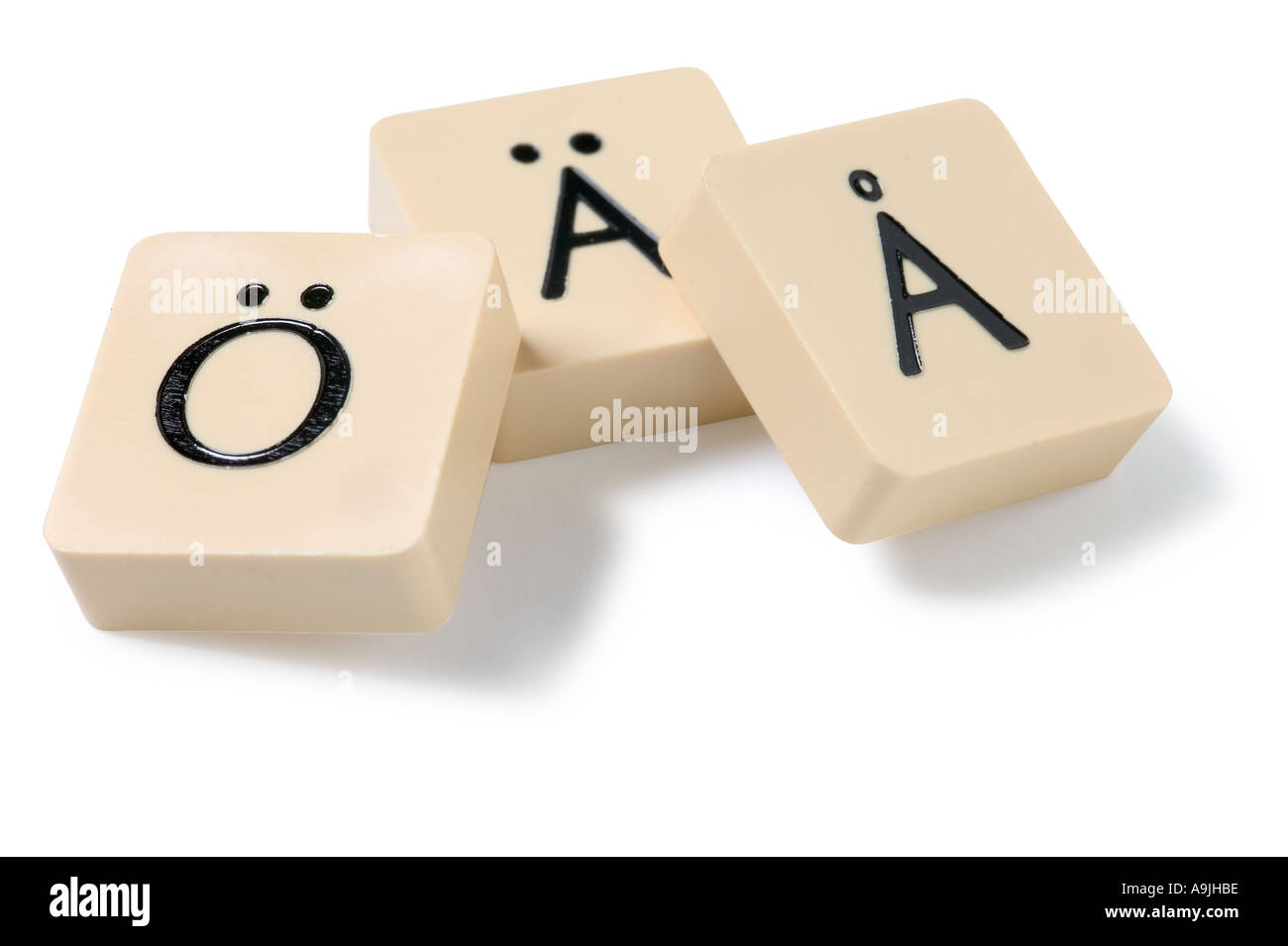 several scrabble letters in plastic Stock Photo - Alamy