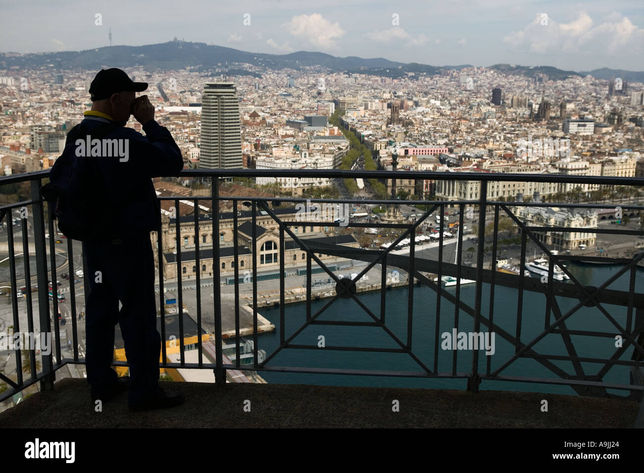 Man watching over fence hi-res stock photography and images - Alamy