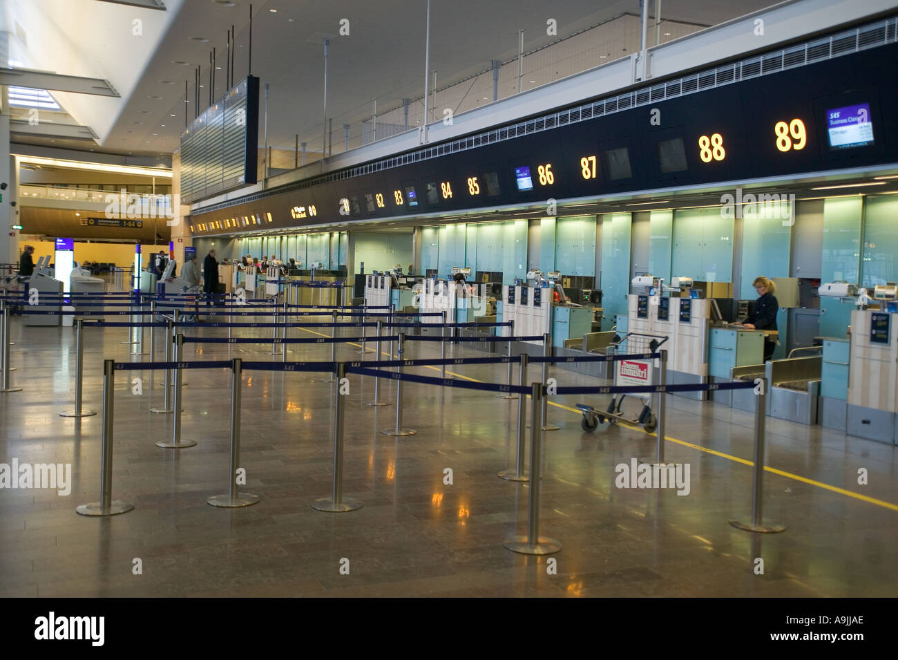 the check in at an airport Stock Photo - Alamy