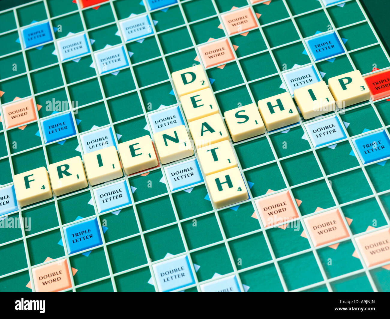 Board game scrabble friendship death word hi-res stock photography and ...