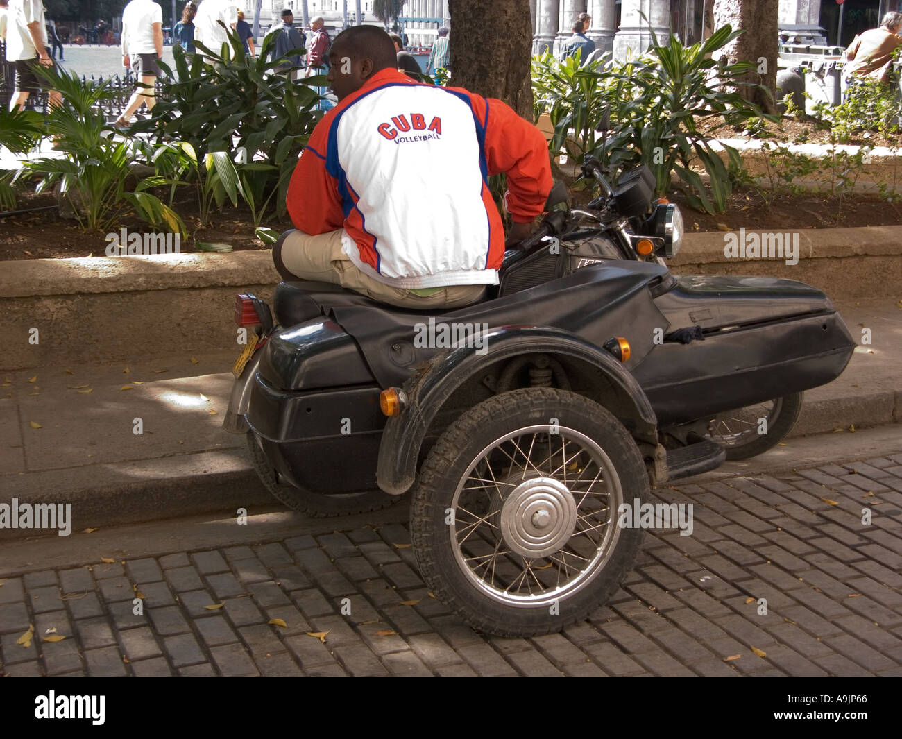 cuba havana afro-cuban man sitting on motorcycle and sidecar Stock ...