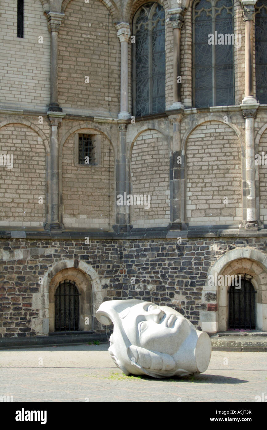 Bonn Basilica of St Martin and huge stone sculpture in front beheaded ...
