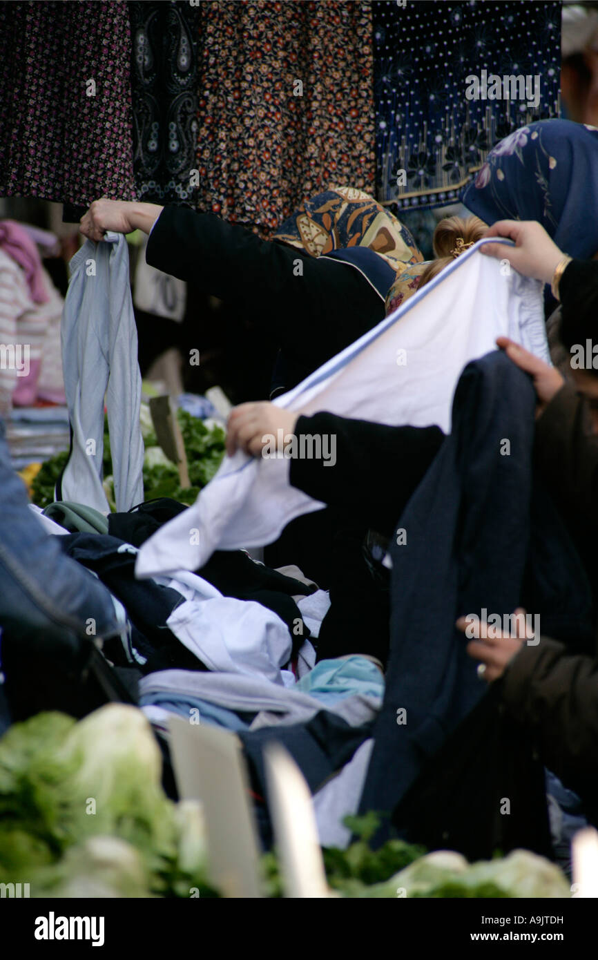 Buying clothes in a market, Istanbul, Turkey Stock Photo - Alamy