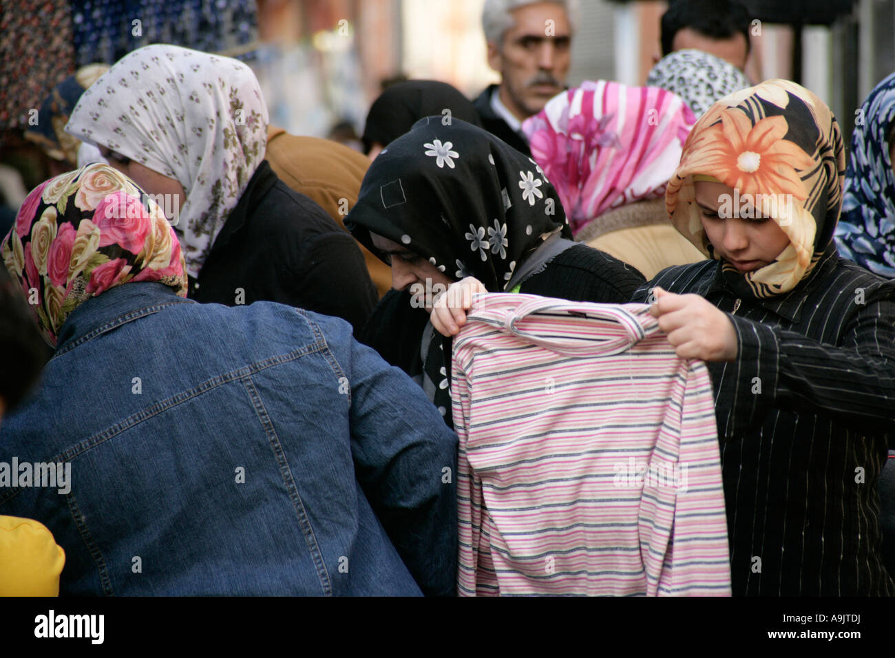 Buying Clothes In A Market Istanbul Turkey Stock Photo Alamy buying-clothes-in-a-market-istanbul-turkey-stock-photo-alamy