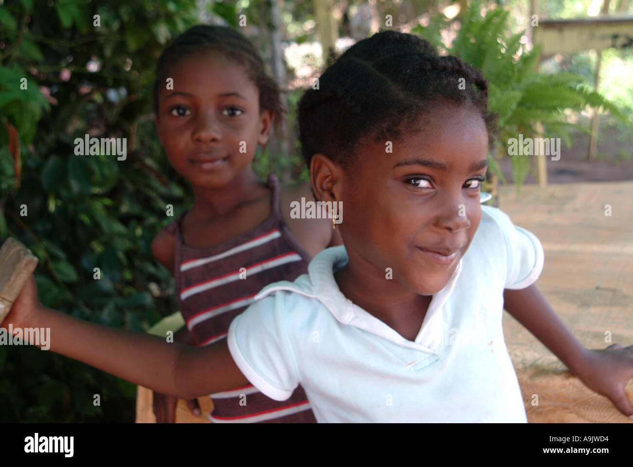 Portrait of two young Afro Caribbean girls Stock Photo - Alamy