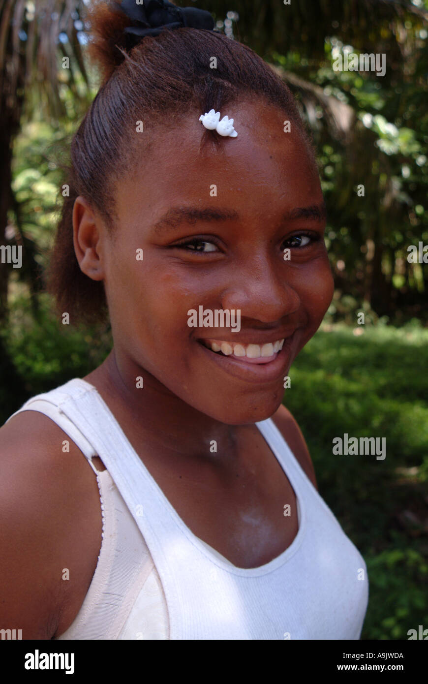 Portrait of a young Afro Caribbean teenage girl smiling Stock Photo - Alamy